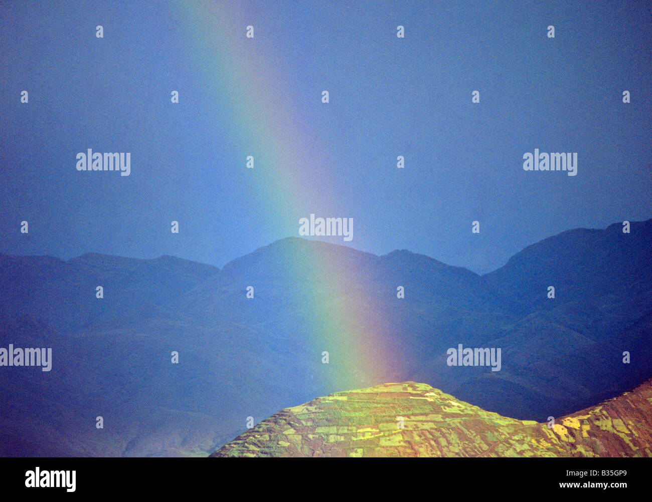 rainbow over arable farm land near city of cuzco andean highland peru ...