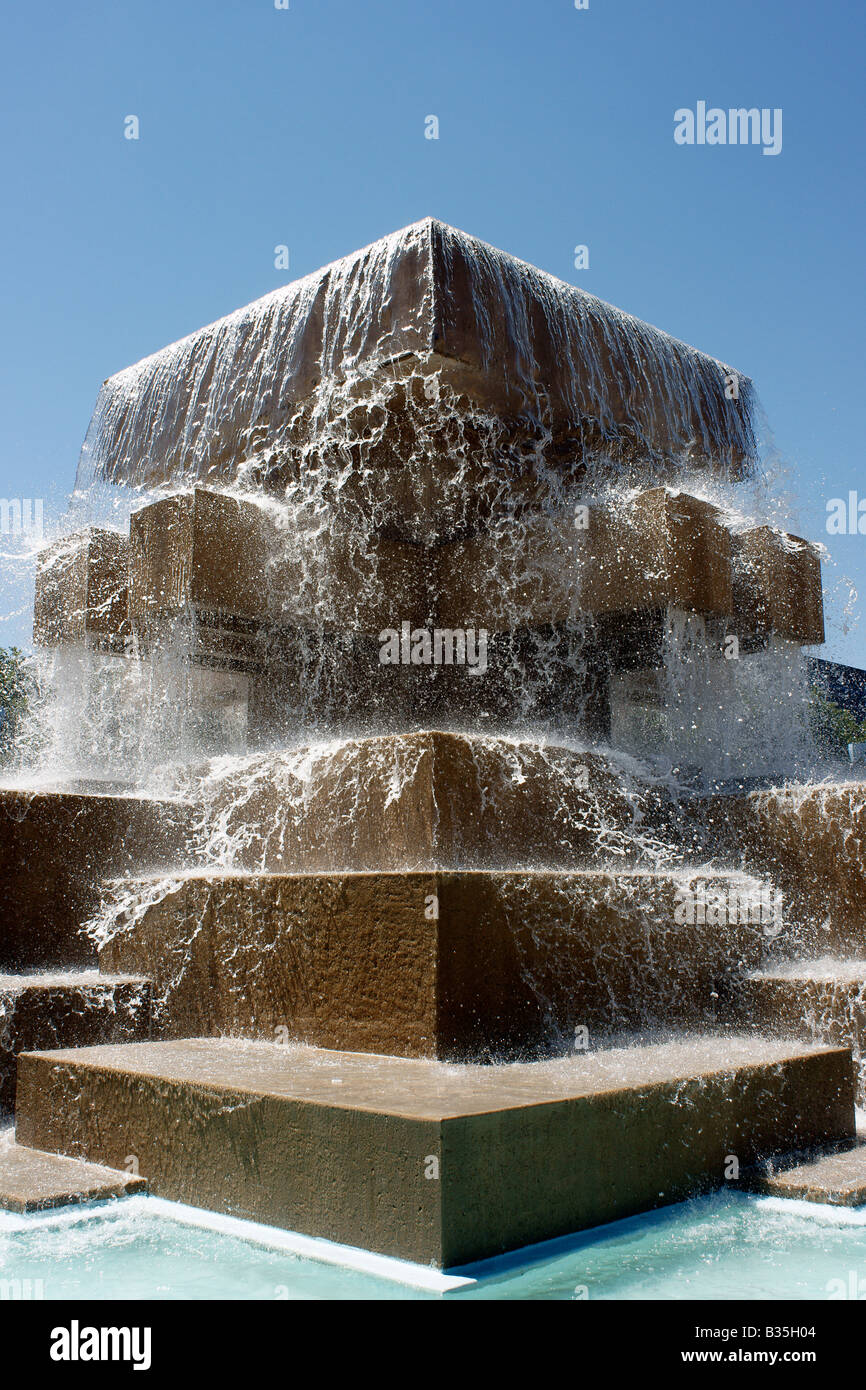 A sparkling fountain in a downtown plaza Stock Photo - Alamy