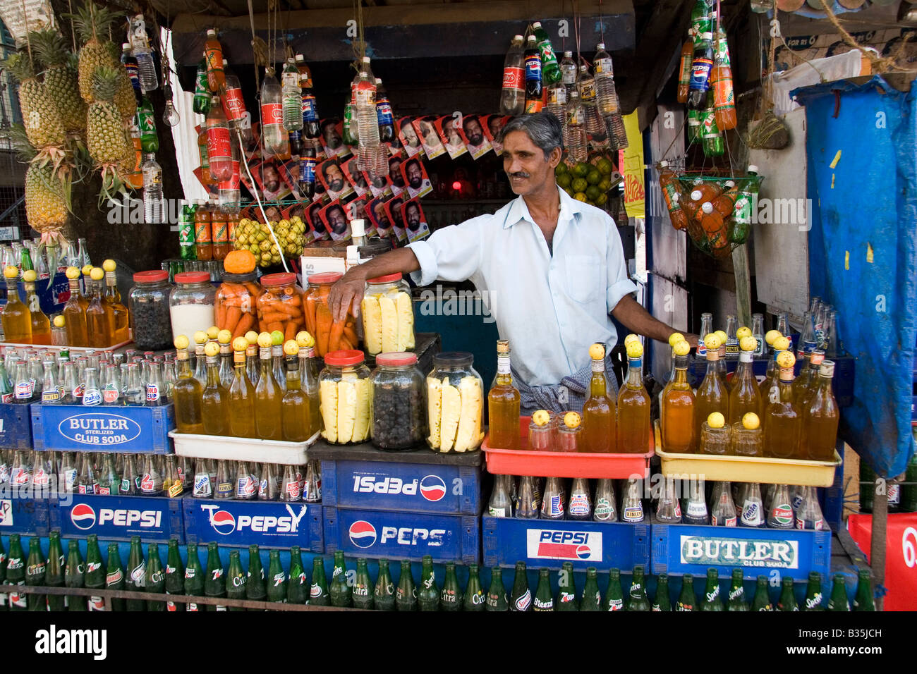 A man works at a refreshments stand in Kochi within Kerala, India. He ...