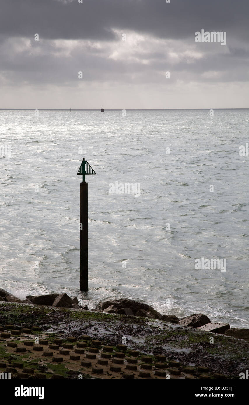 a navigation marker on the shoreline at Portsmouth Stock Photo - Alamy