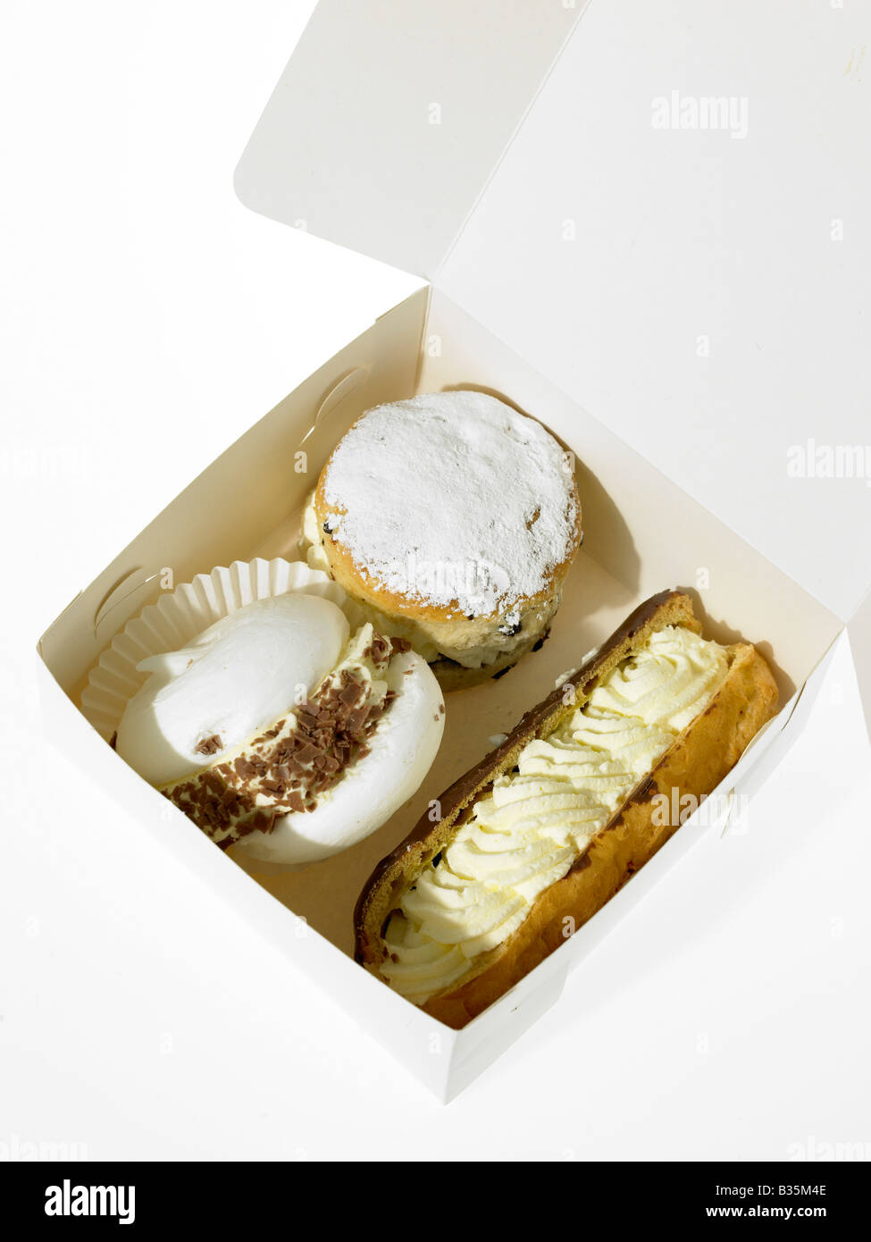 Cream Cakes in take out packaging Stock Photo - Alamy