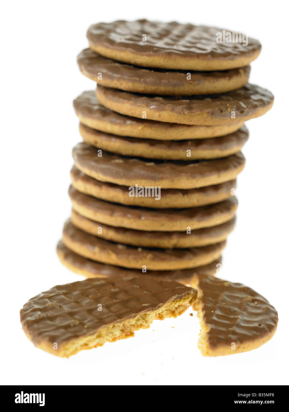 Stack of Chocolate Biscuits with one broken in half Stock Photo - Alamy