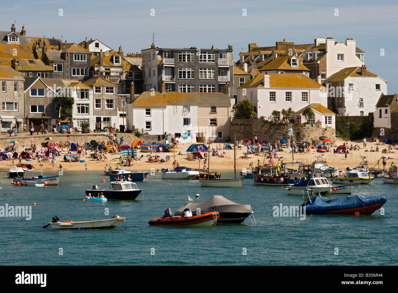 St Ives Harbour with boats and houses on seaside Stock Photo - Alamy
