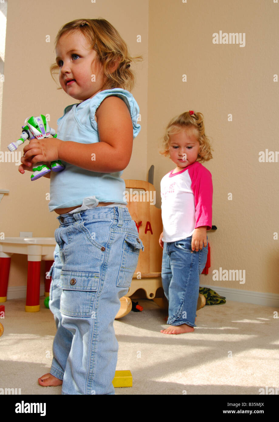 Two girls playing Stock Photo - Alamy