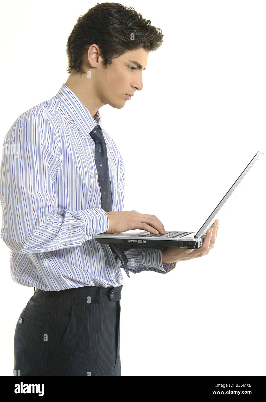 Side profile of a businessman using a laptop Stock Photo - Alamy