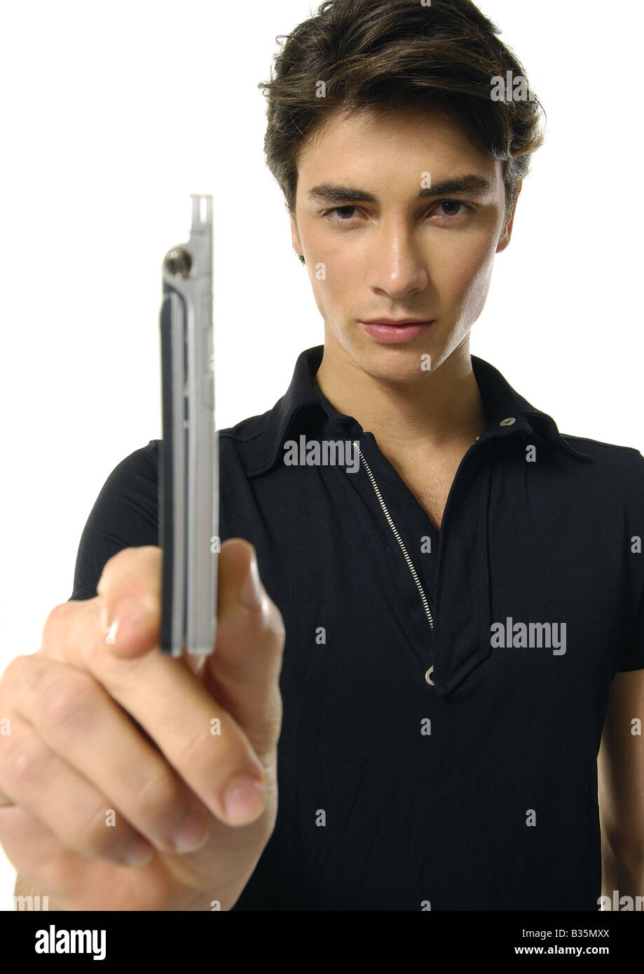 Portrait of a young man showing a mobile phone Stock Photo - Alamy