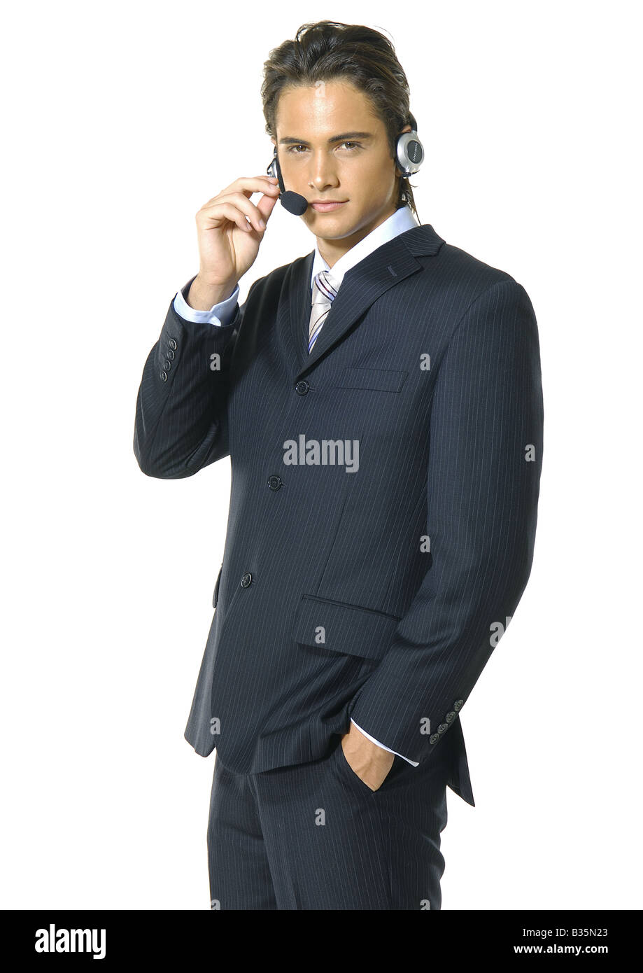 Portrait of a businessman wearing a headset Stock Photo - Alamy
