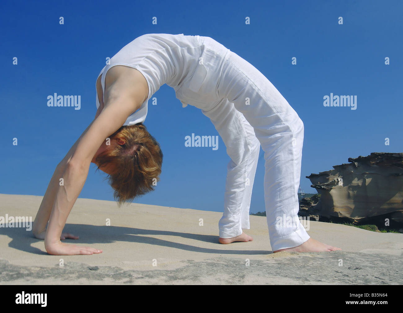 Bending over backward hi-res stock photography and images - Alamy