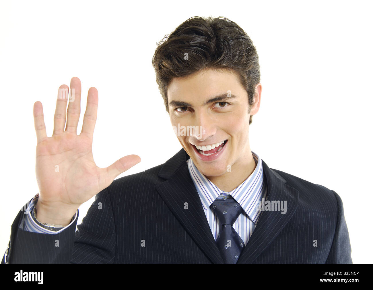 Portrait of a businessman making a stop gesture and smiling Stock Photo ...