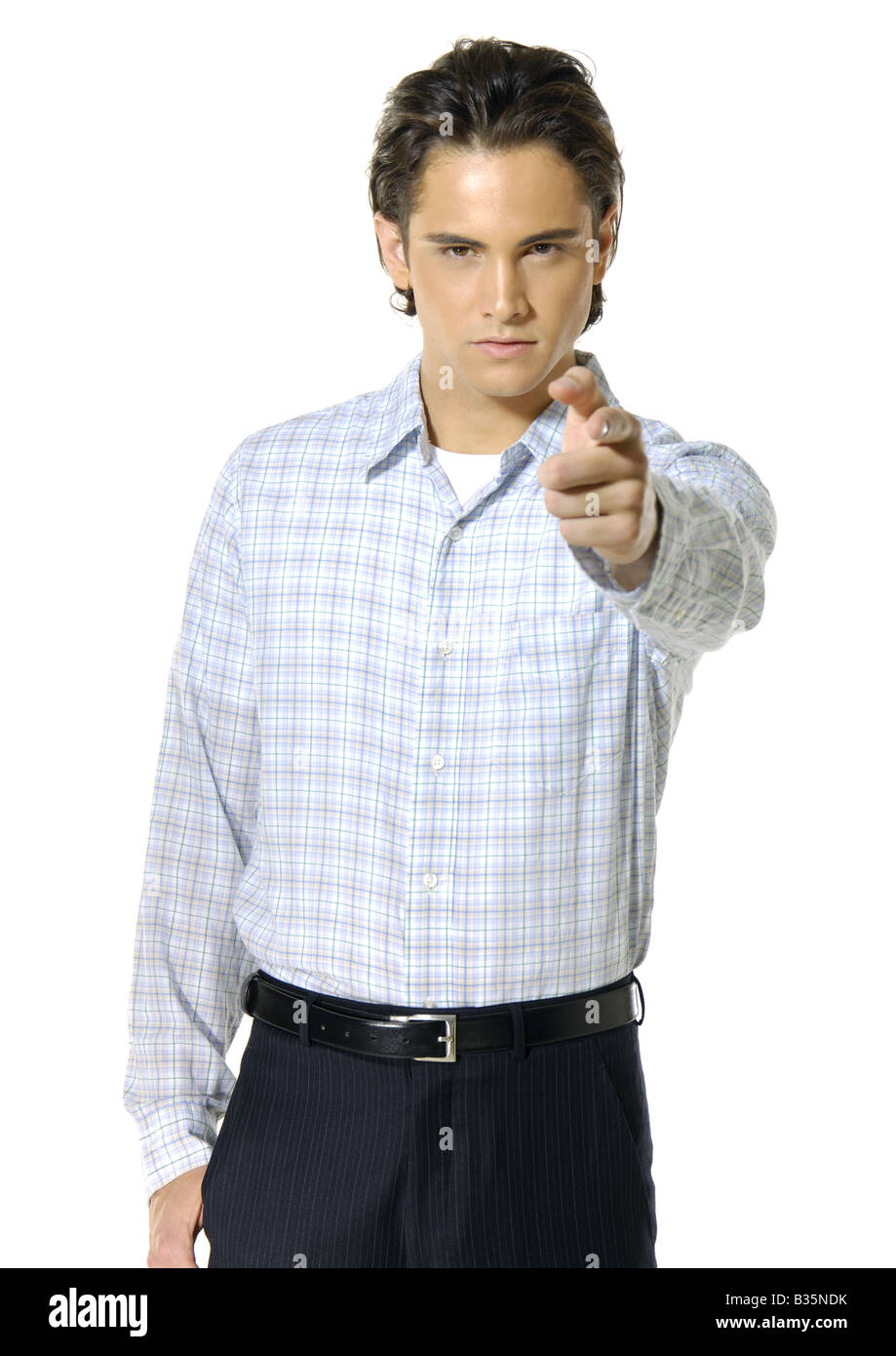 Portrait of a young man pointing Stock Photo - Alamy