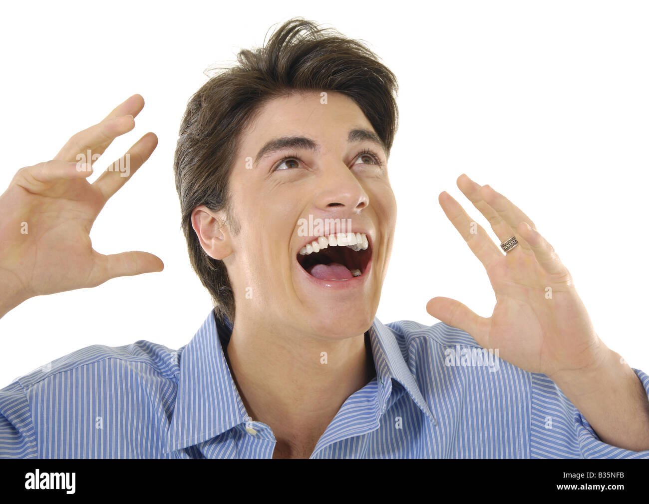 Close-up of a young man laughing Stock Photo - Alamy