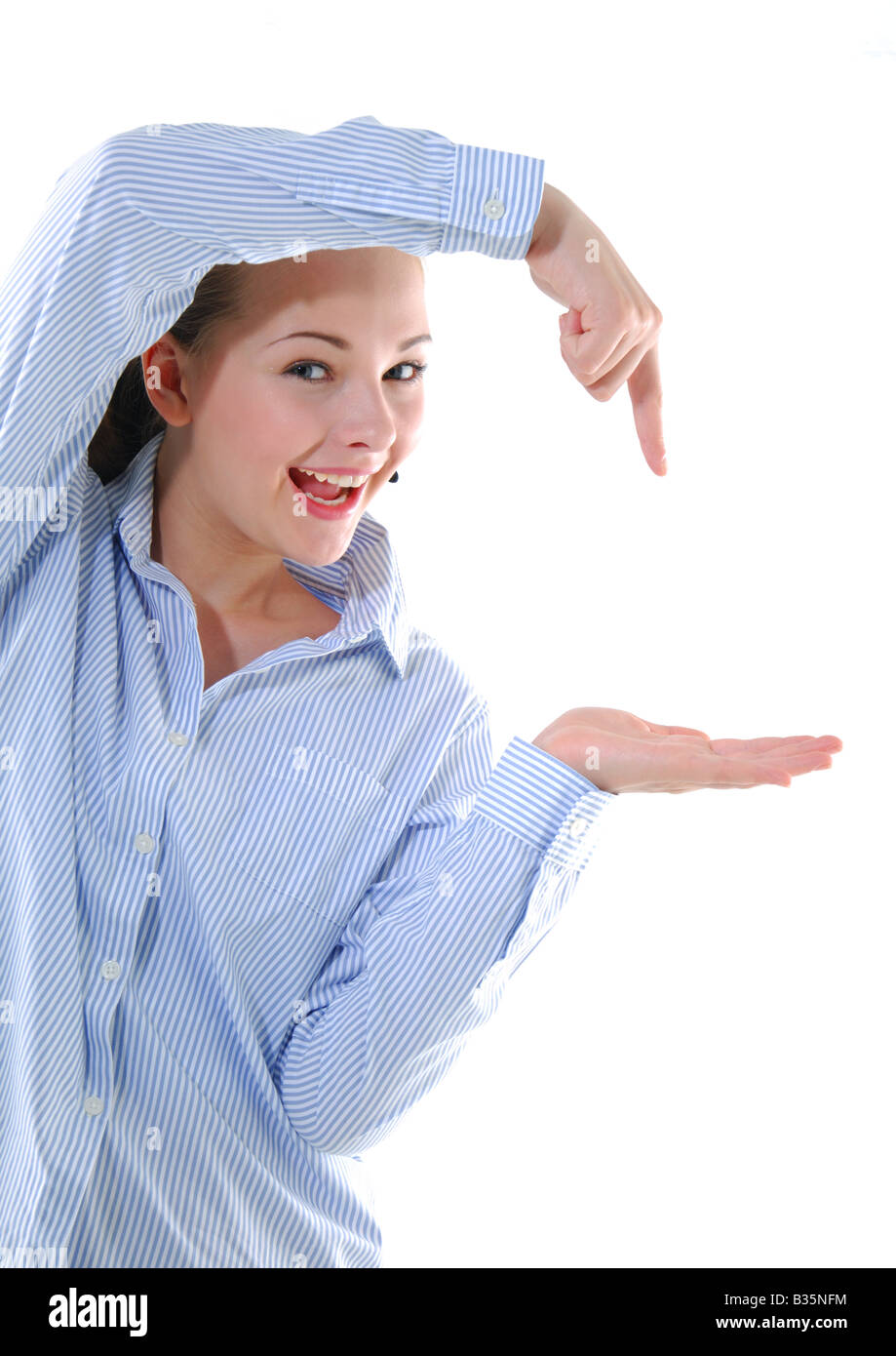 Portrait of a young woman gesturing Stock Photo - Alamy