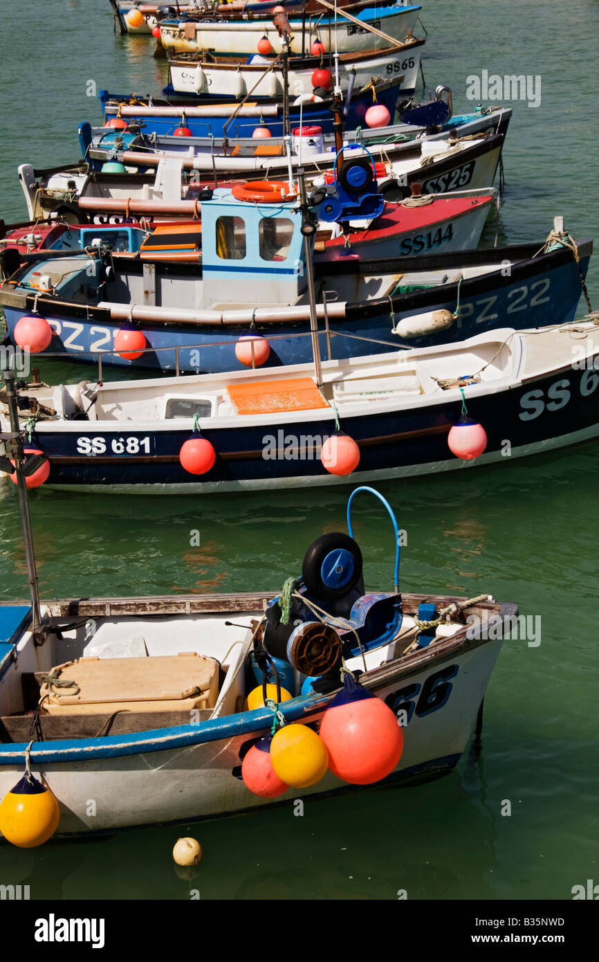 Row of fishing boats hi-res stock photography and images - Alamy