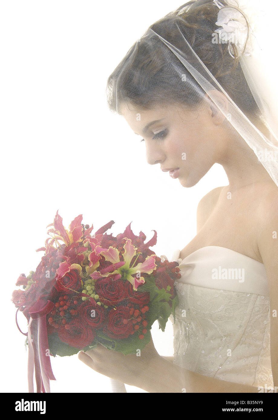 Side profile bride holding bouquet hi-res stock photography and images ...