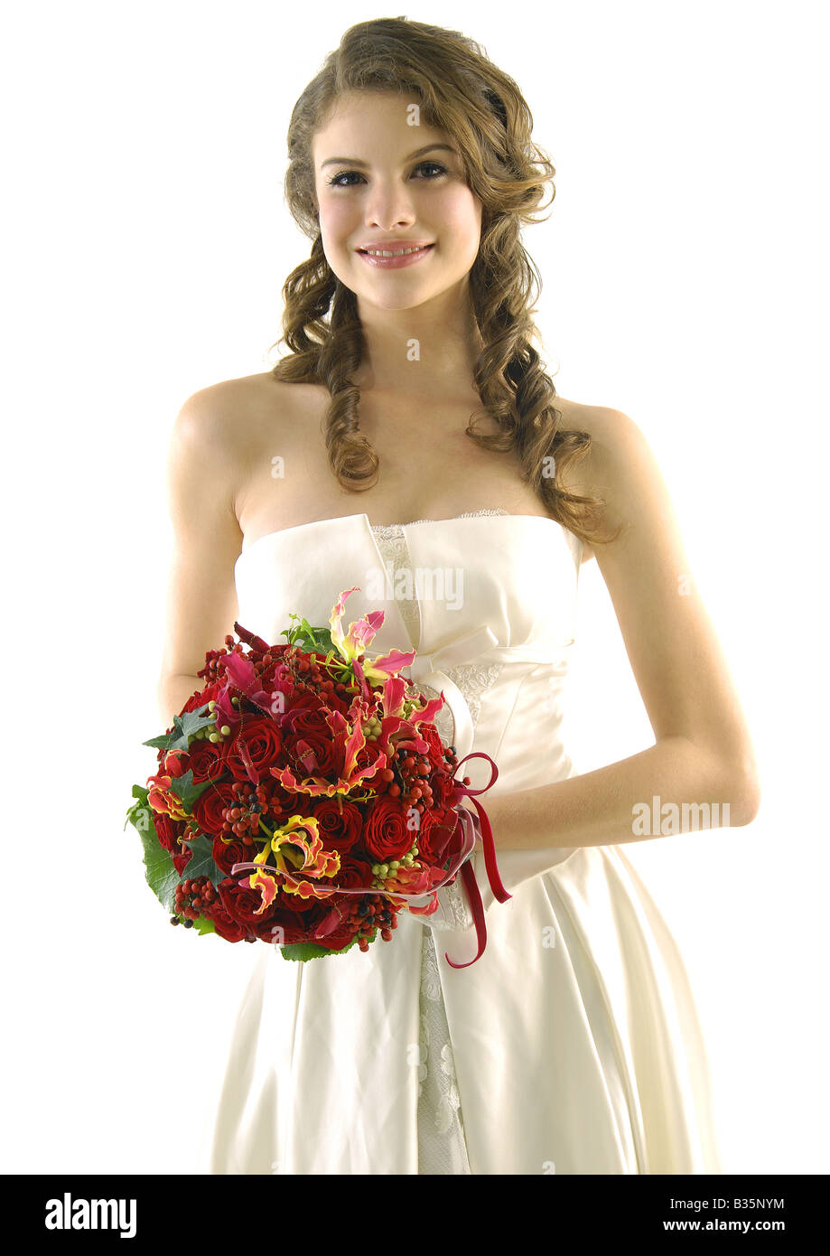 Portrait of a bride holding a bouquet of flowers and smiling Stock ...