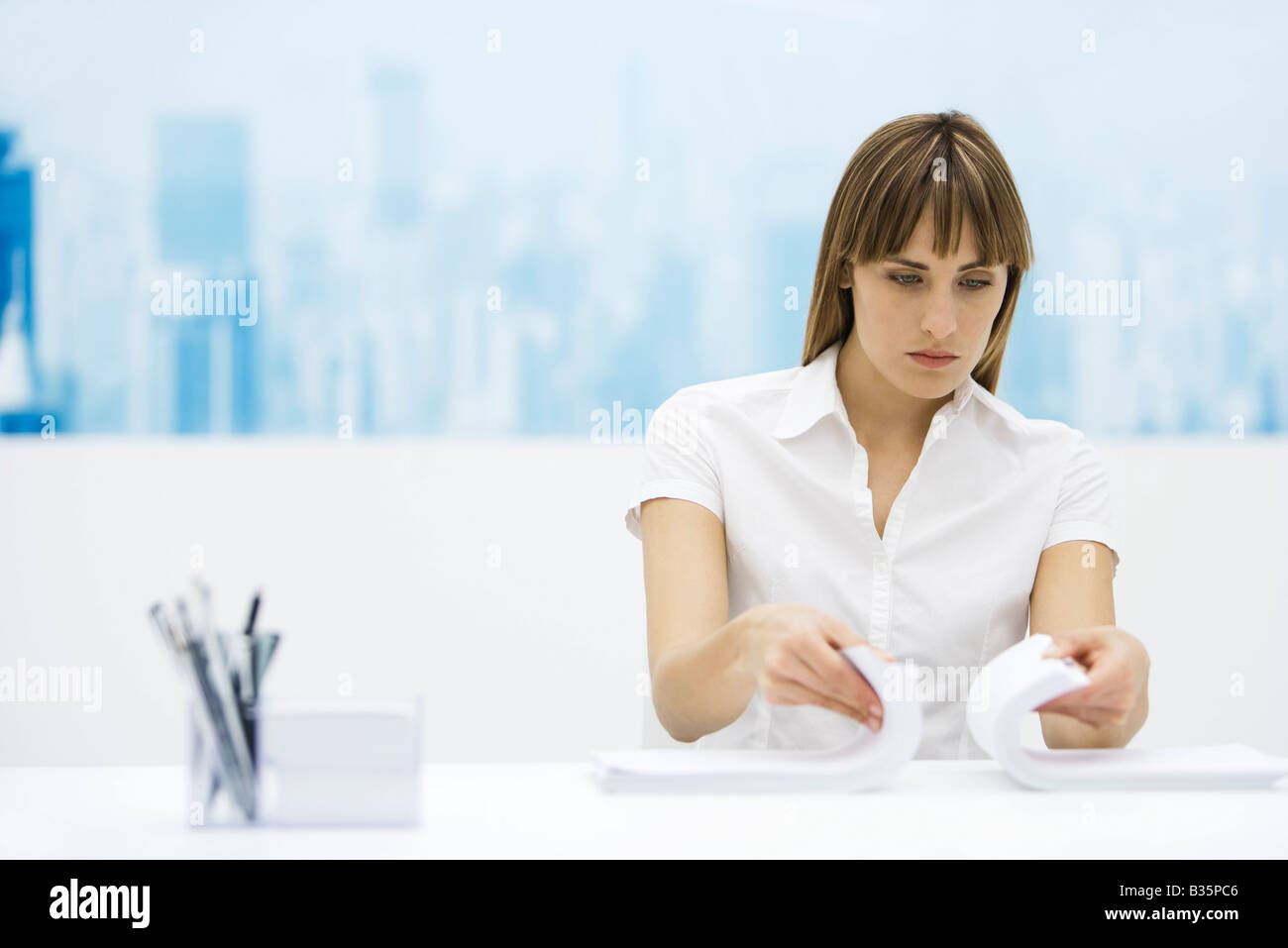 Paper shuffling hi-res stock photography and images - Alamy