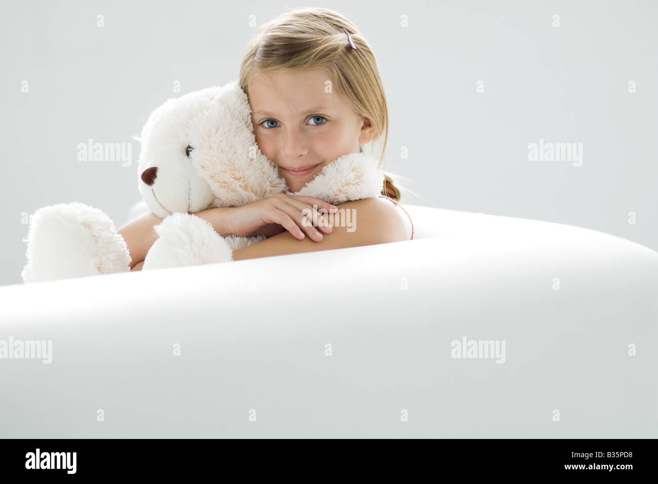 Girl holding teddy bear, smiling at camera Stock Photo - Alamy Girl holding teddy bear, smiling at camera Stock Photo - Alamy