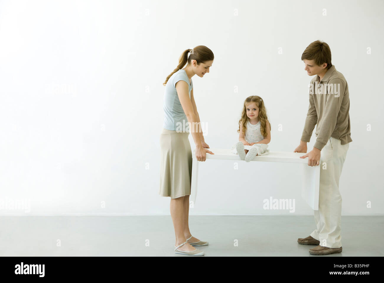 Carrying the tables hi-res stock photography and images - Alamy