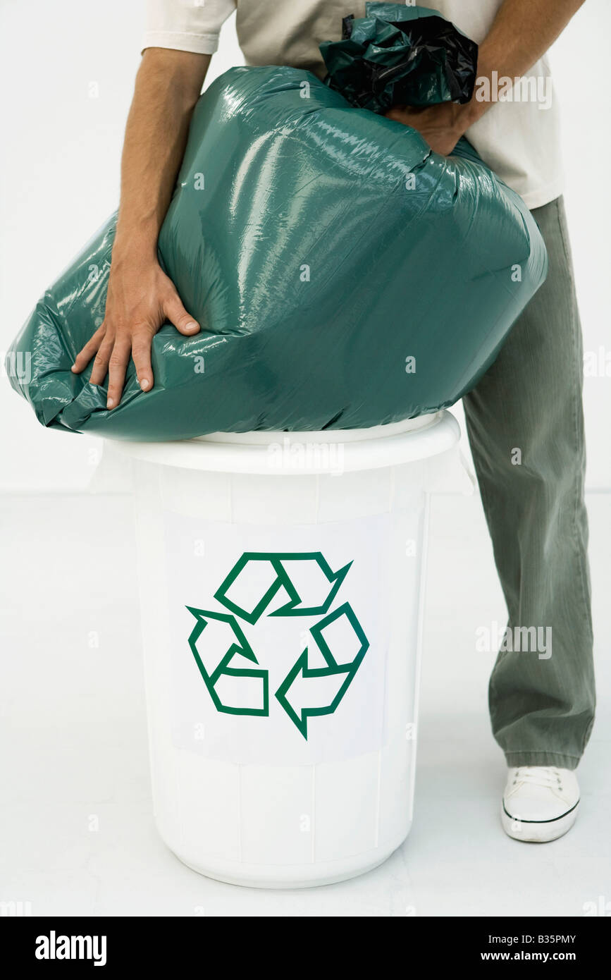 Man wear trash bag hi-res stock photography and images - Alamy