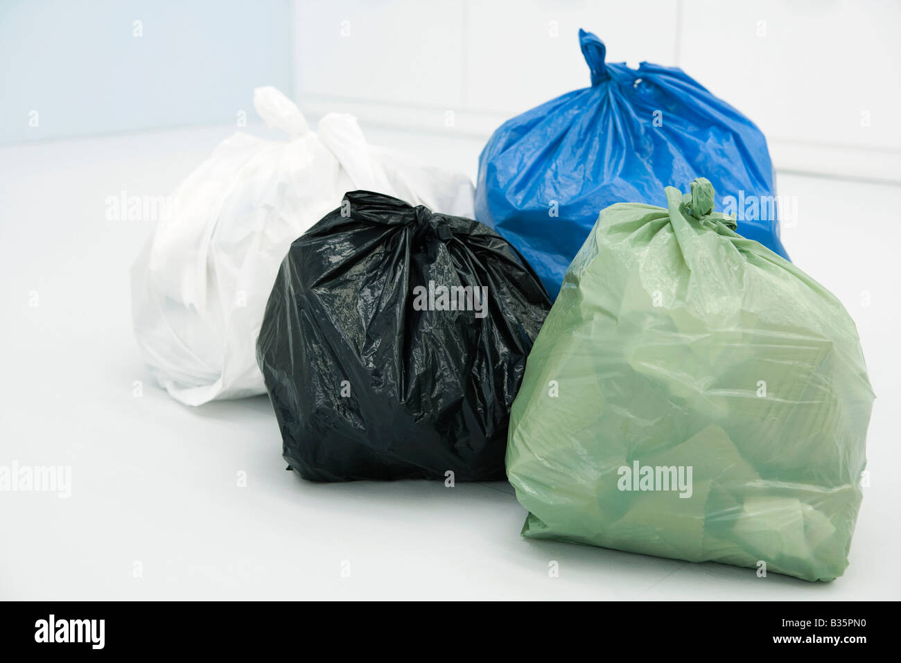 Assortment of garbage bags, all full Stock Photo - Alamy