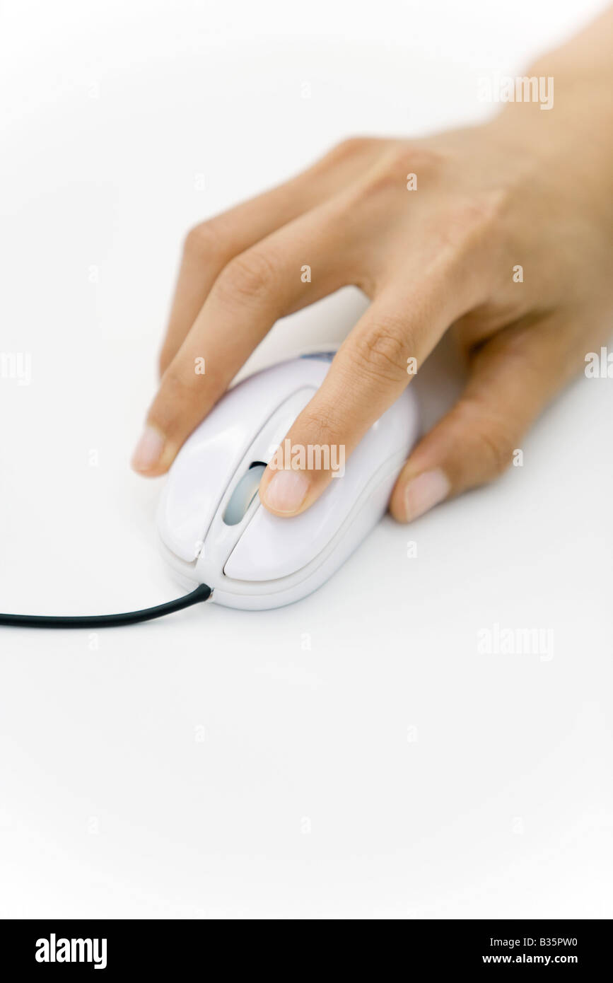 Hand using computer mouse, close-up Stock Photo - Alamy