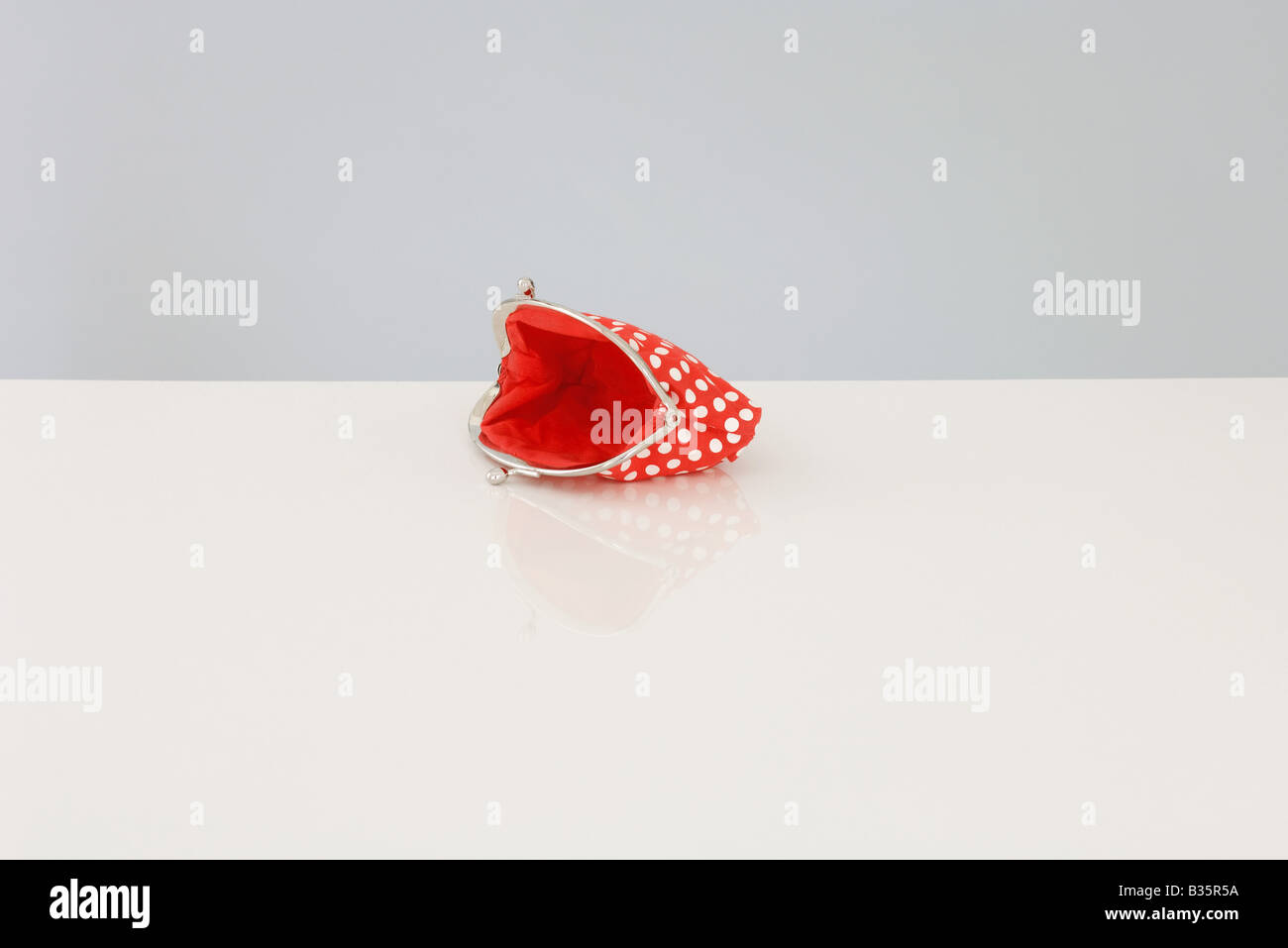 Open and empty coin purse Stock Photo - Alamy