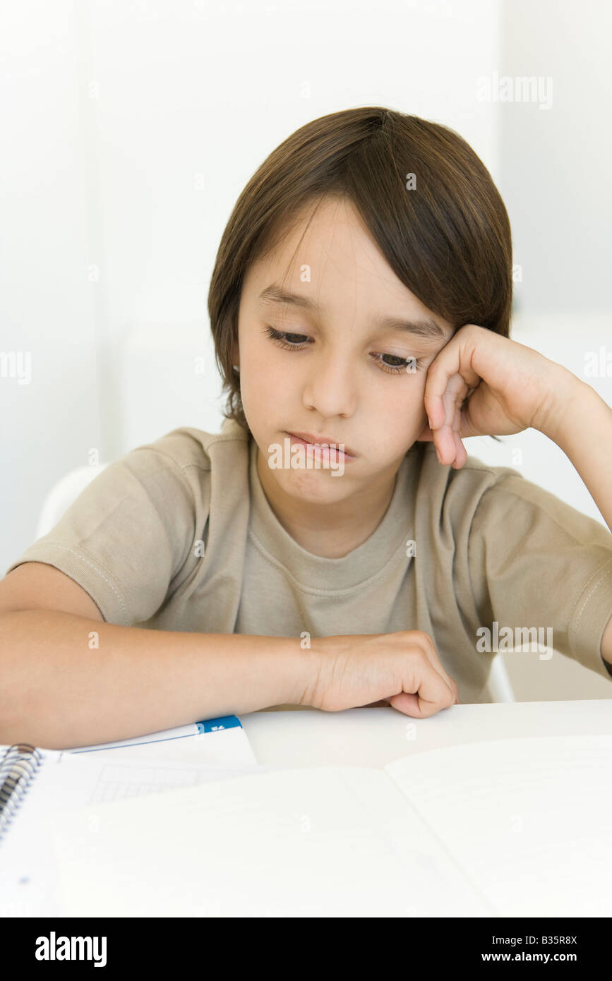 Boy scowling hi-res stock photography and images - Alamy