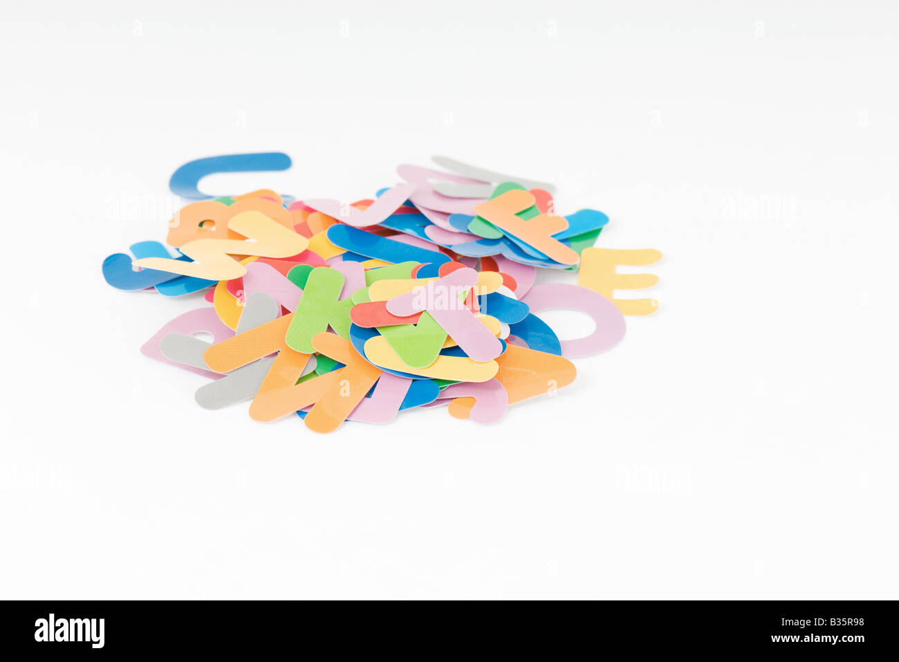 Colorful alphabet letters in a heap Stock Photo - Alamy