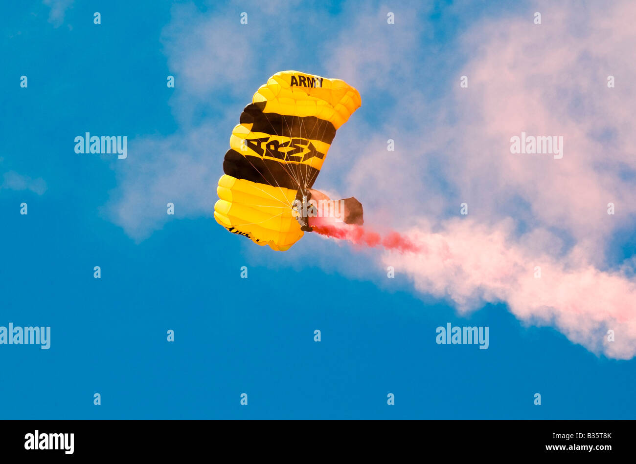 Skydiver & Parachute & Smoke Trail Stock Photo - Alamy