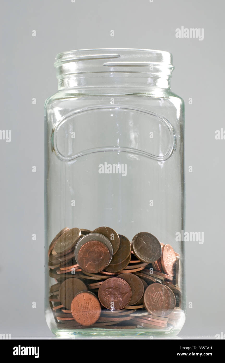 Two glass jar coins hi-res stock photography and images - Alamy