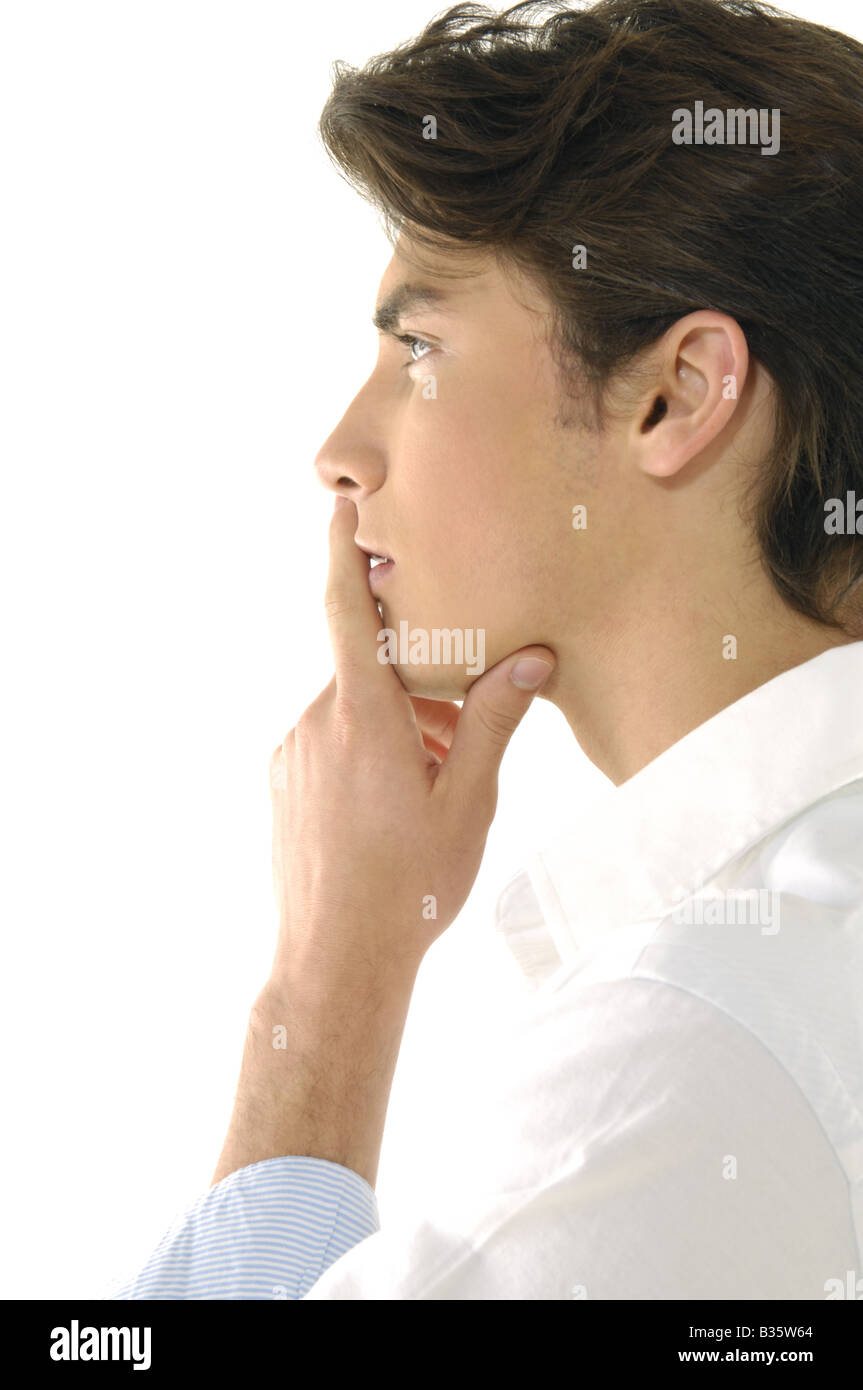 Side profile of a young man thinking Stock Photo - Alamy