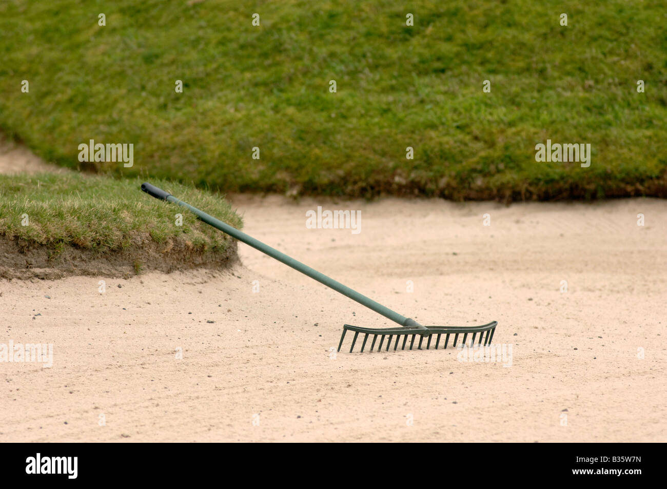 Golf Bunker Rake Stock Photo - Alamy