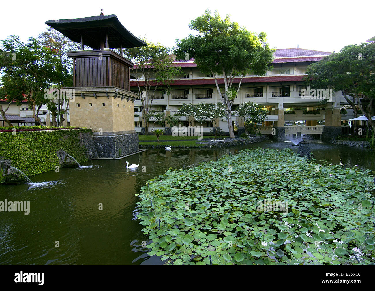 View of a pond outside a resort building Stock Photo - Alamy