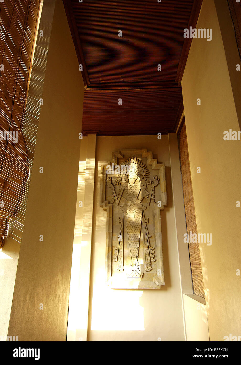 Carved stone artifact on a wall Stock Photo - Alamy