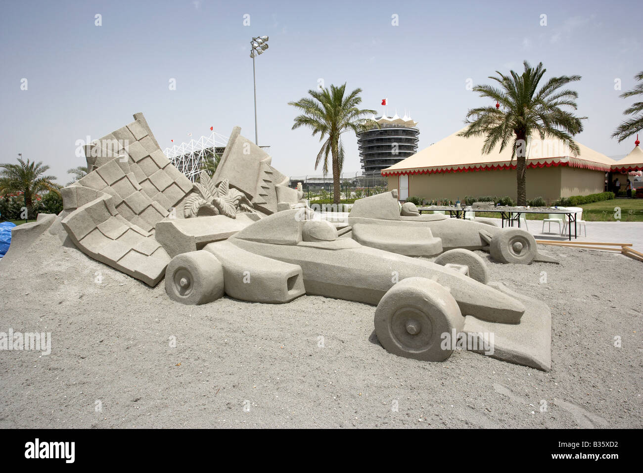 Beach, sand sculpture of a formula 1 Grand Prix racing car on display ...