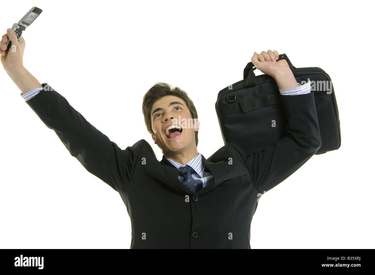 Businessman shouting and holding a mobile phone Stock Photo - Alamy