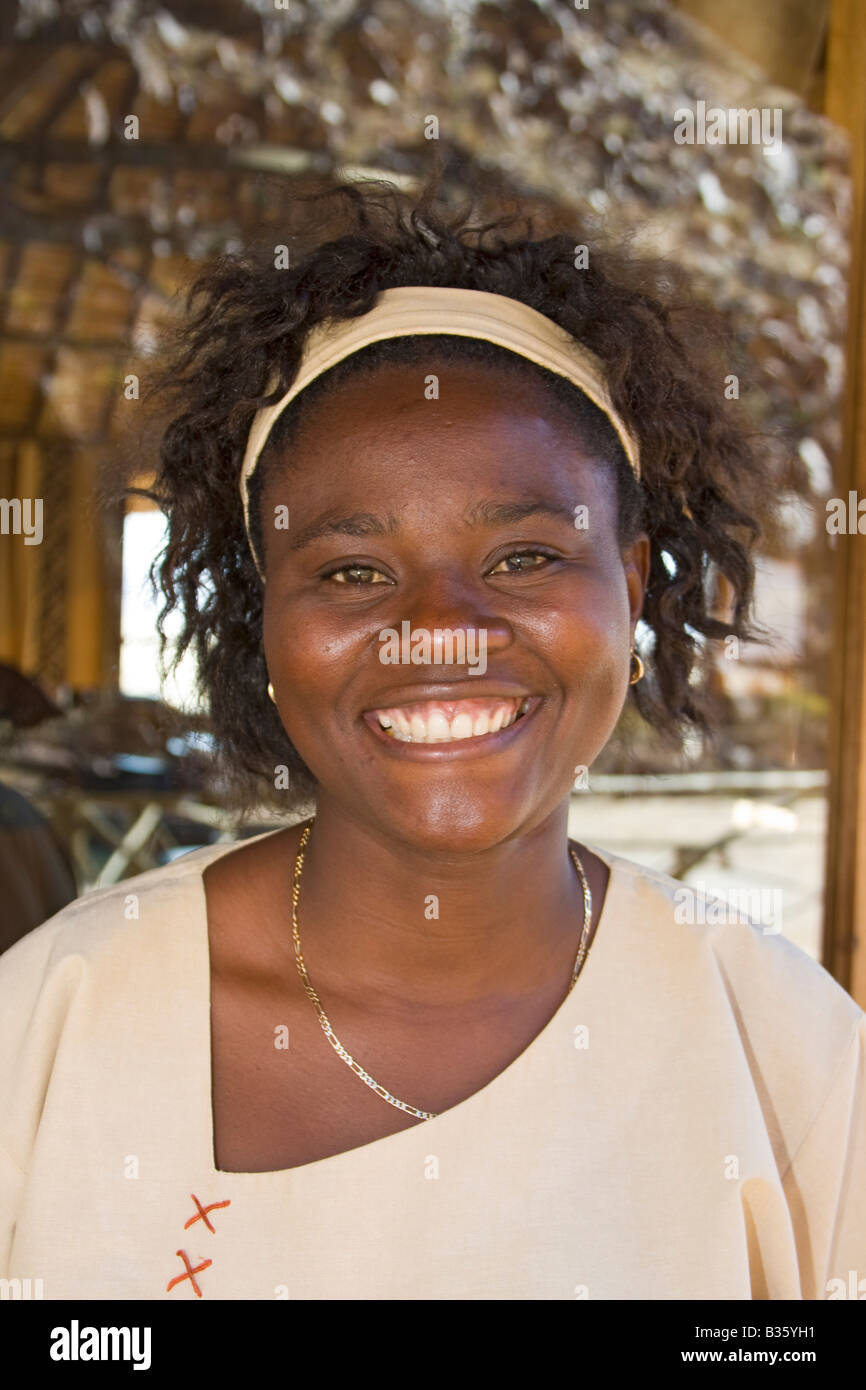 Woman staff worker at safari lodge who is also member of Himba tribe in ...