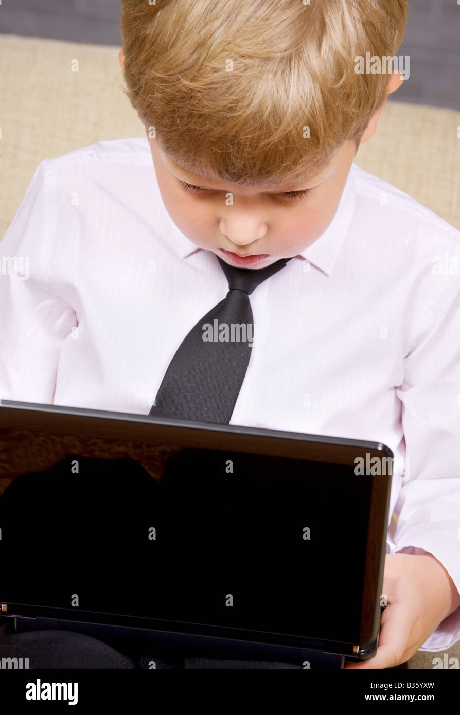 picture of boy with black laptop computer Stock Photo - Alamy