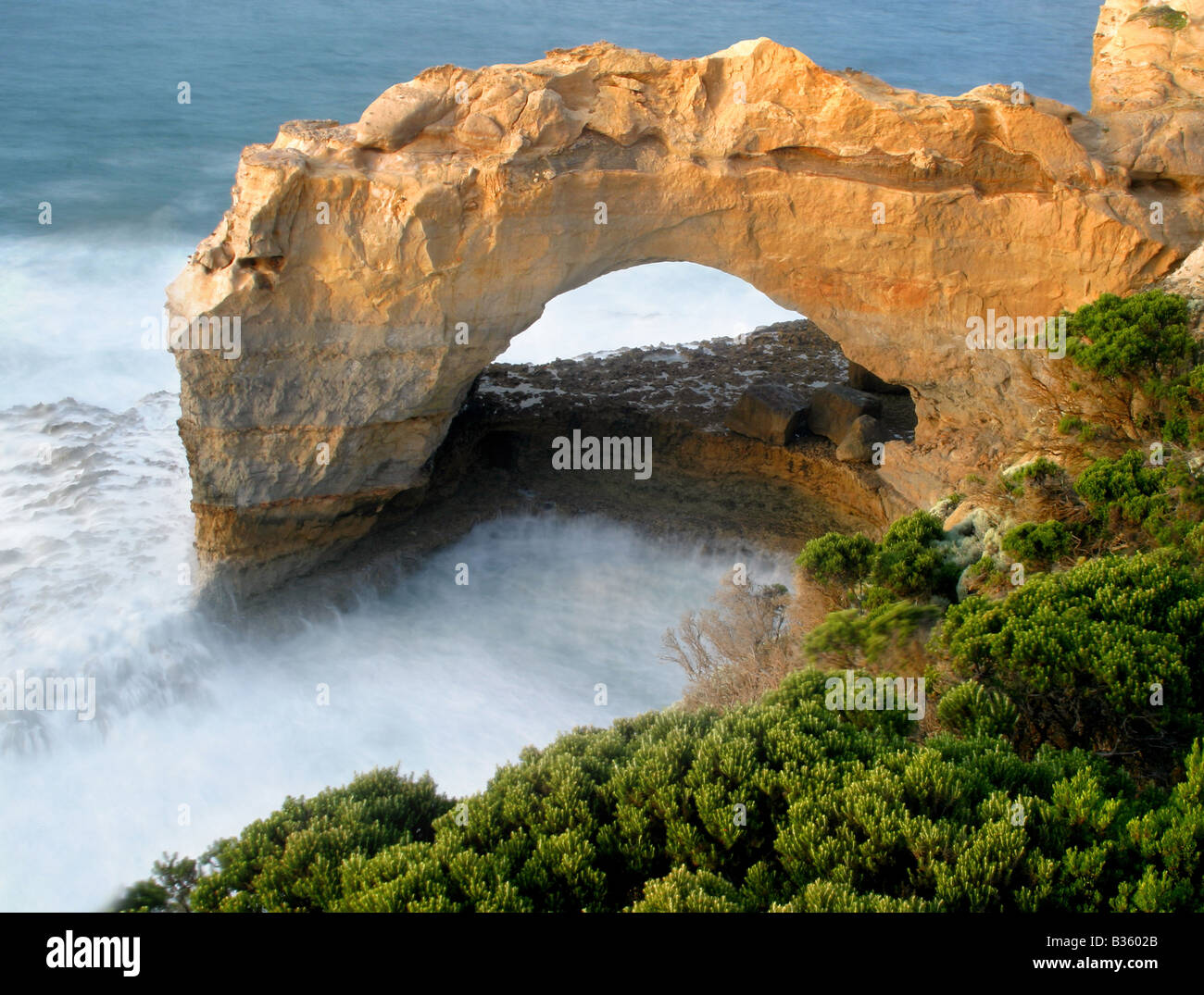 Wave action, ocean arch, Great Ocean Road, Australia Stock Photo - Alamy