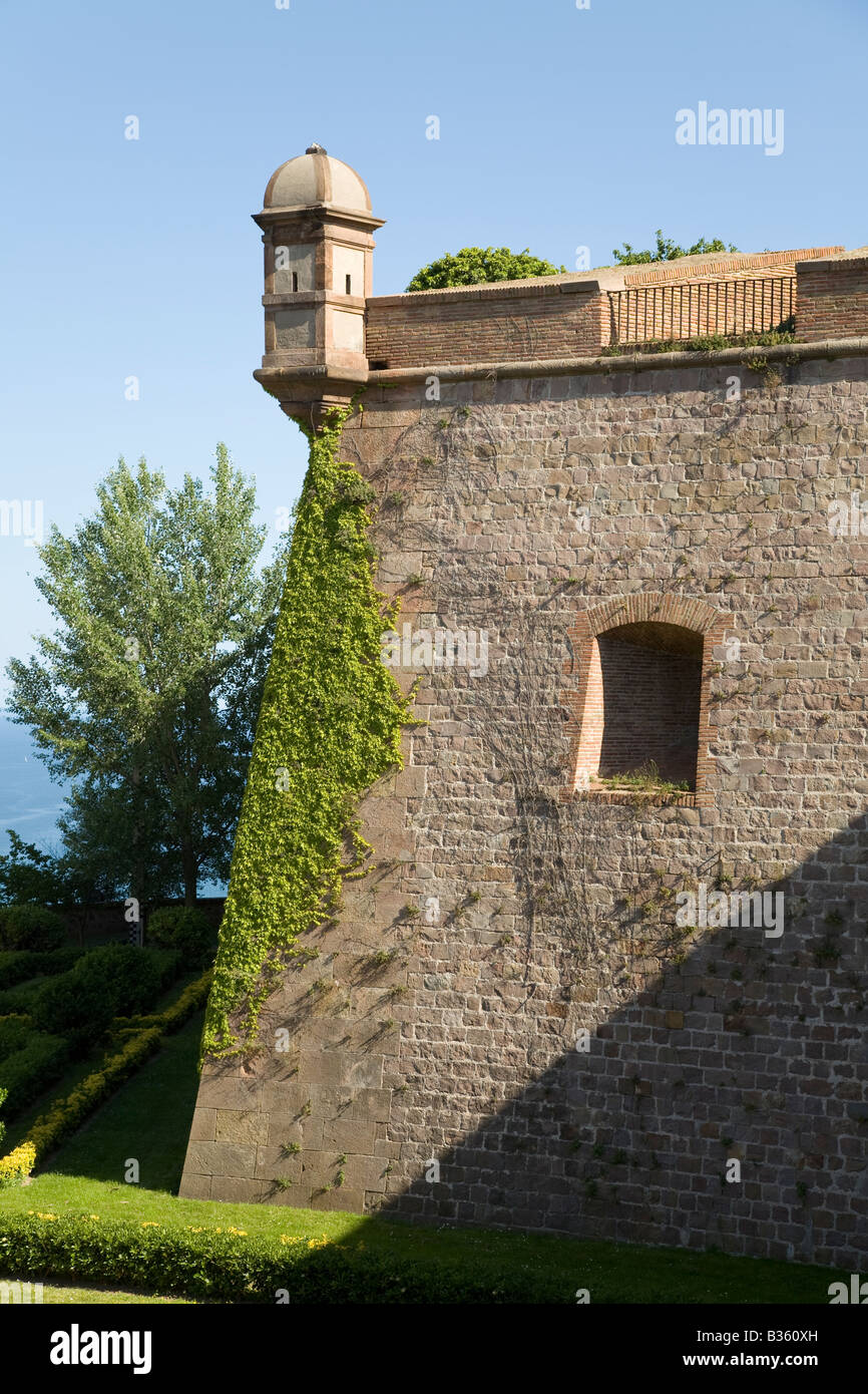 SPAIN Barcelona Stone wall and sentry towers of Castle of Montjuic ...