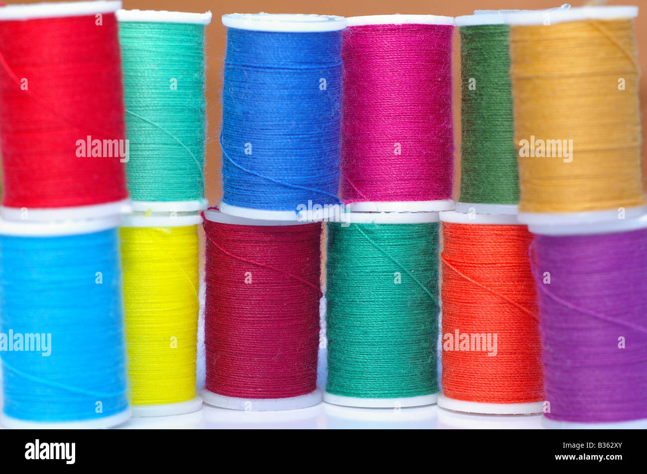 Red and white coloured threads hi-res stock photography and images - Alamy