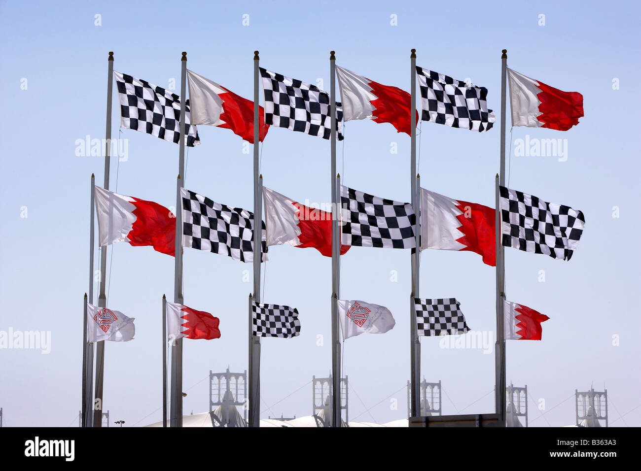 Checkered and Bahrain flags fly at the 2008 Bahrain Formula 1 Grand ...