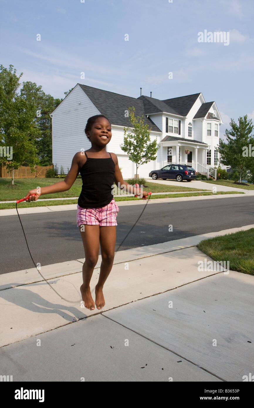 African american girl jumping rope hi-res stock photography and images ...