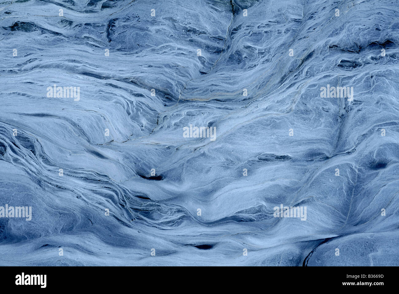 Close up showing detail within the pale blue argillaceous slate rock ...