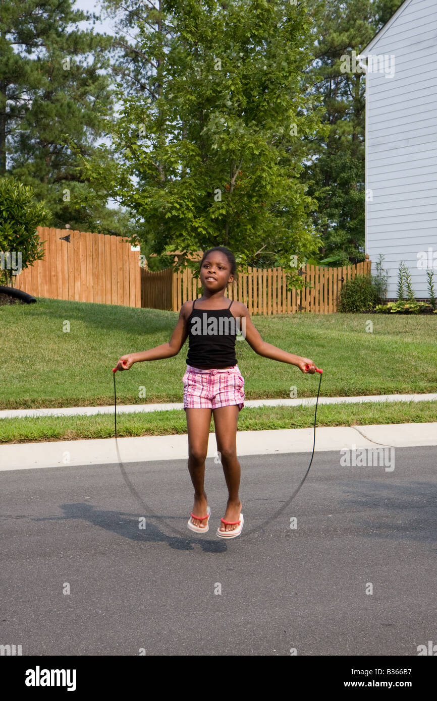 African american girl jumping rope hi-res stock photography and images ...