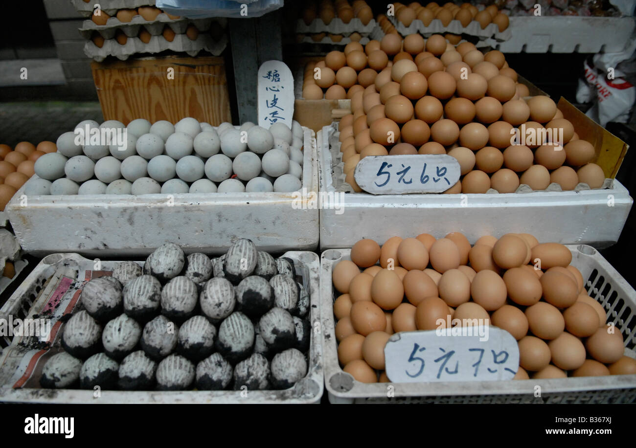 Various types of eggs for sale in a chinese market Stock Photo - Alamy