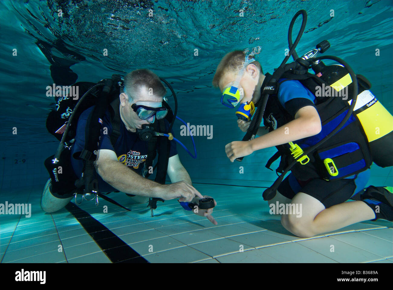 Teach swimming skills hi-res stock photography and images - Alamy