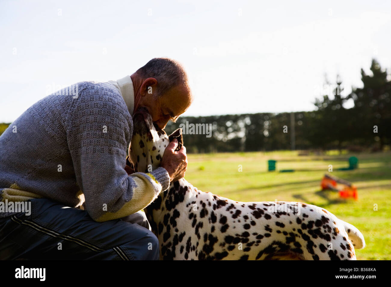 Man with his dalmatian dog hi-res stock photography and images - Alamy