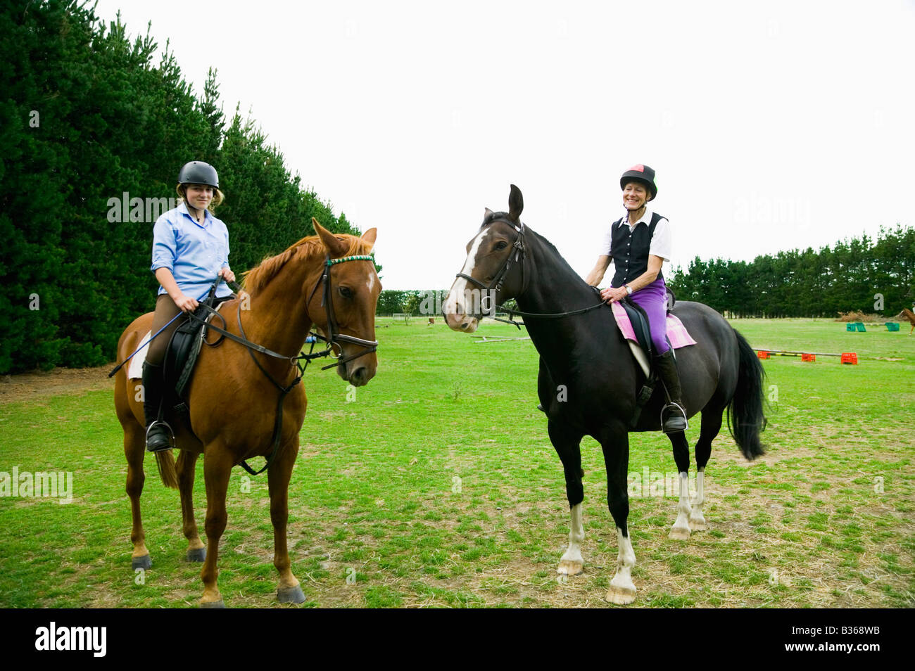 Blond girl riding horse hi-res stock photography and images - Alamy