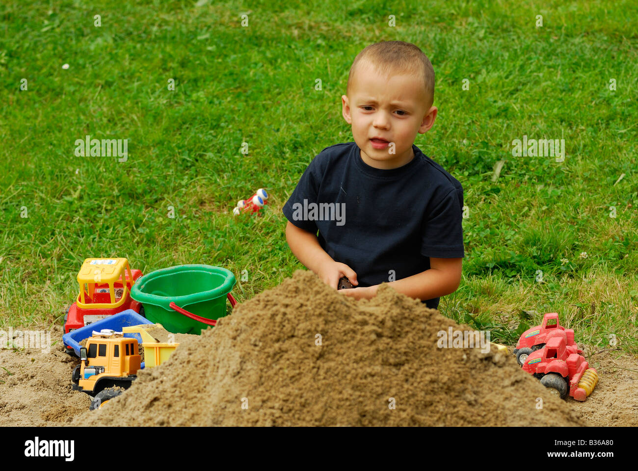 Baby boy boys in sand pit playing toys playground 1 2 years Stock Photo ...